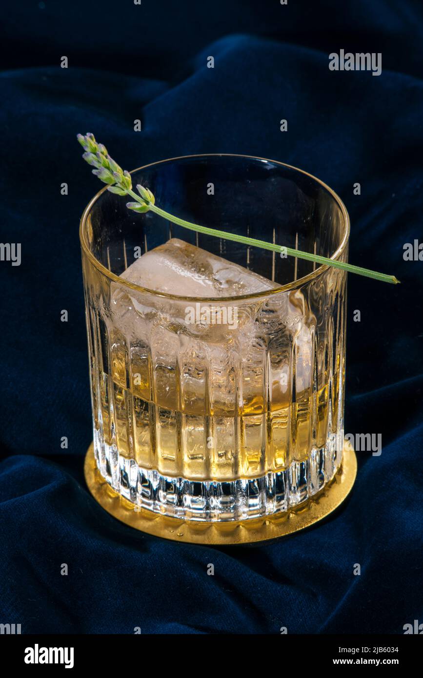 Compound gin or bathtub gin garnished with lavender; it is inspired by ...