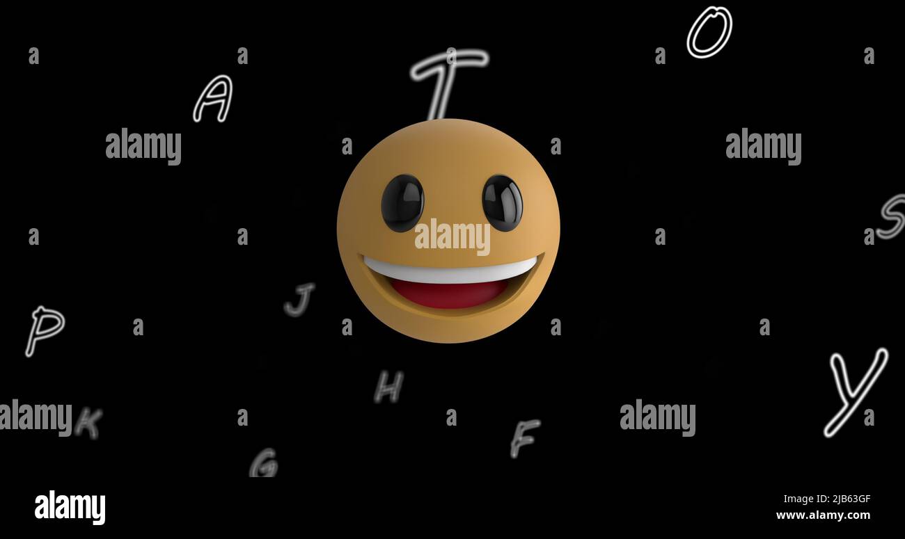 Image of smiley emoji icon floating over letters on black background ...