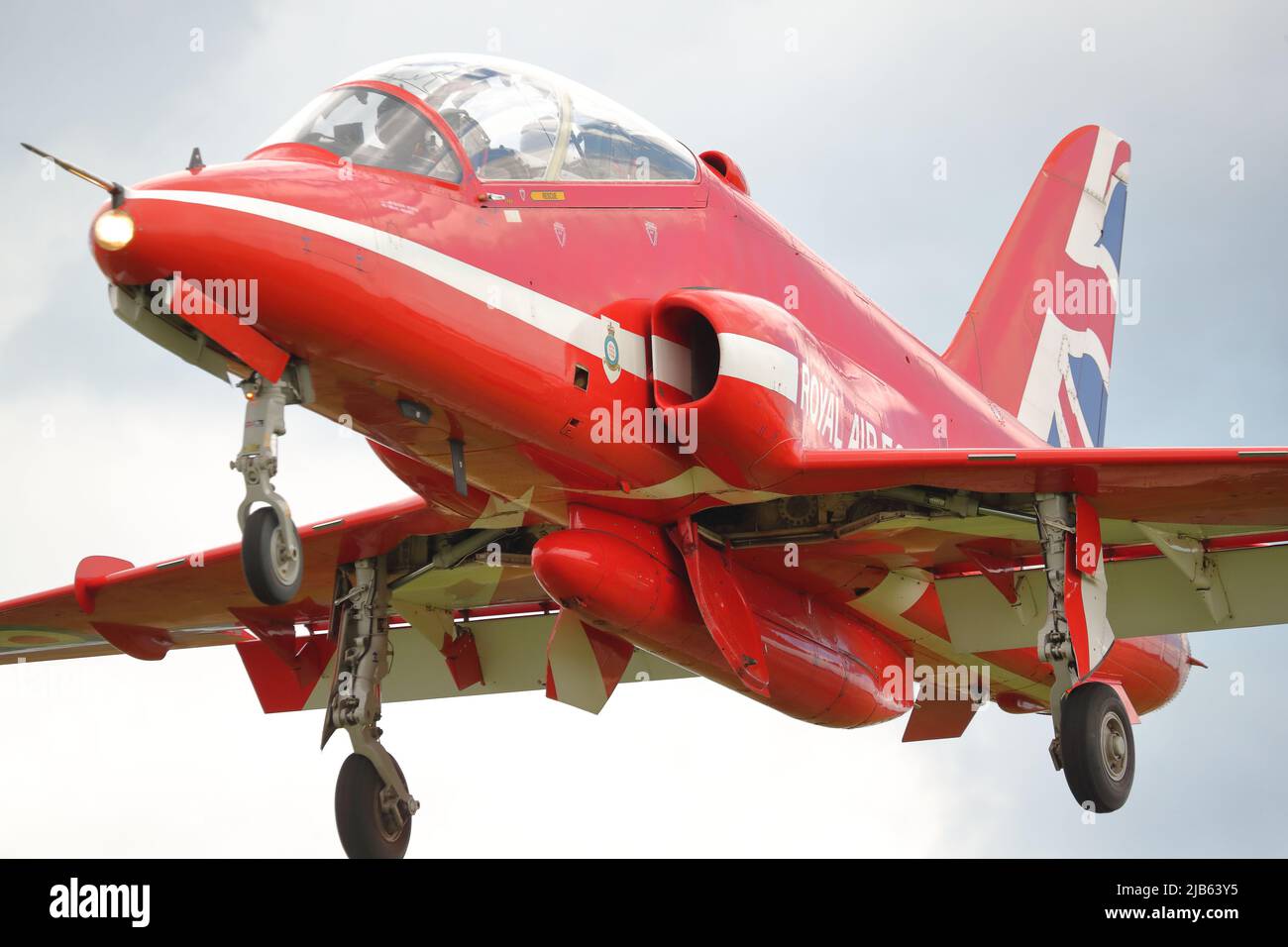 A member of the Red Arrows landing at RAF Fairford after the flypast ...