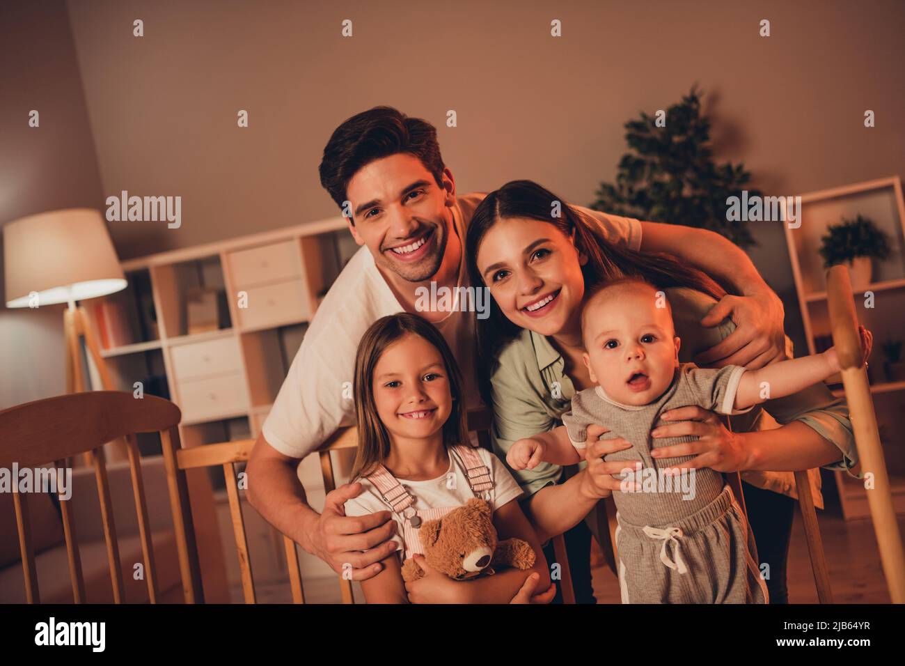 Family portrait of positive loving people siblings preteen baby mom dad ...