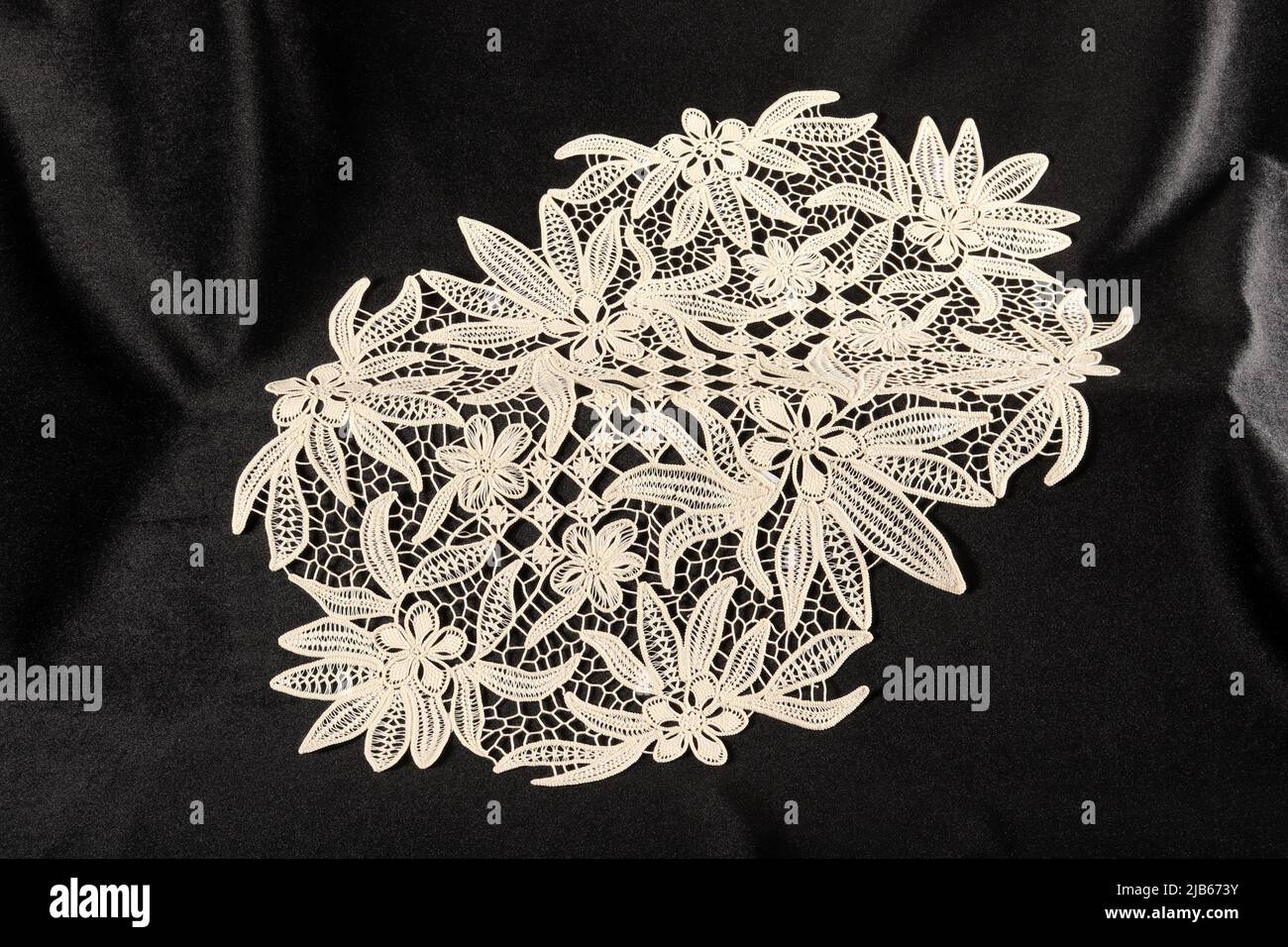 decorative lace on black background Stock Photo - Alamy