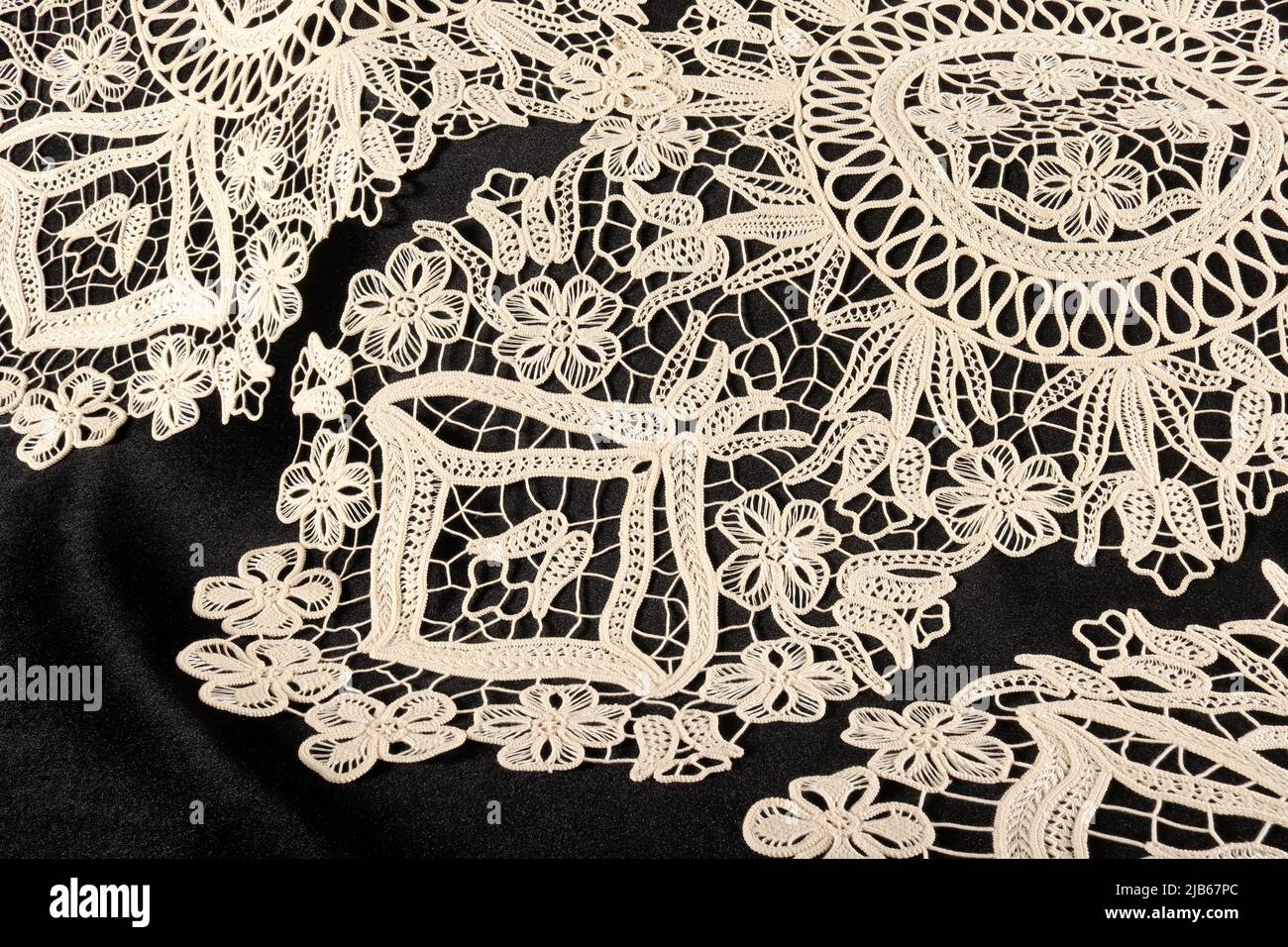 decorative lace on black background Stock Photo - Alamy