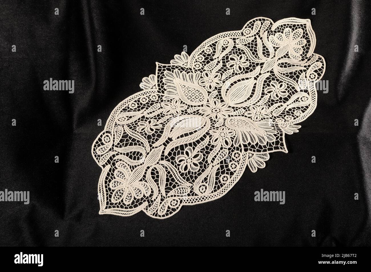 decorative lace on black background Stock Photo - Alamy