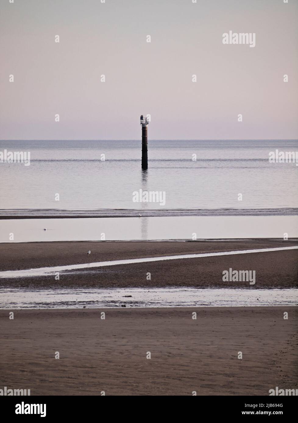 Sea structure and beach near Pontins, Prestatyn, North Wales Stock ...