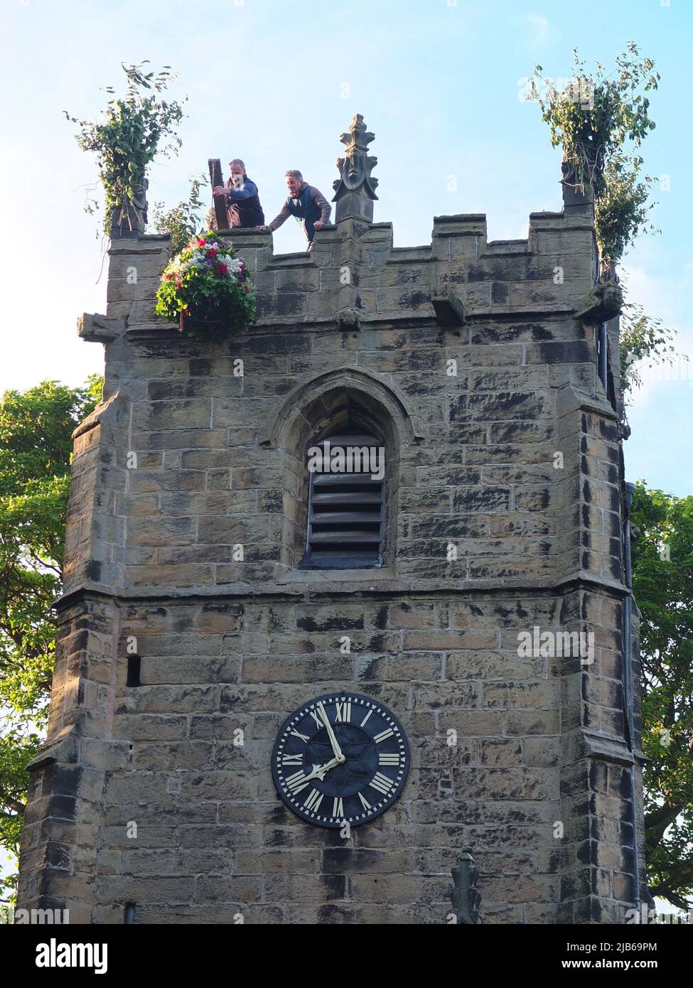 The Garland is hoisted up the tower of St Edmunds Church at the ...