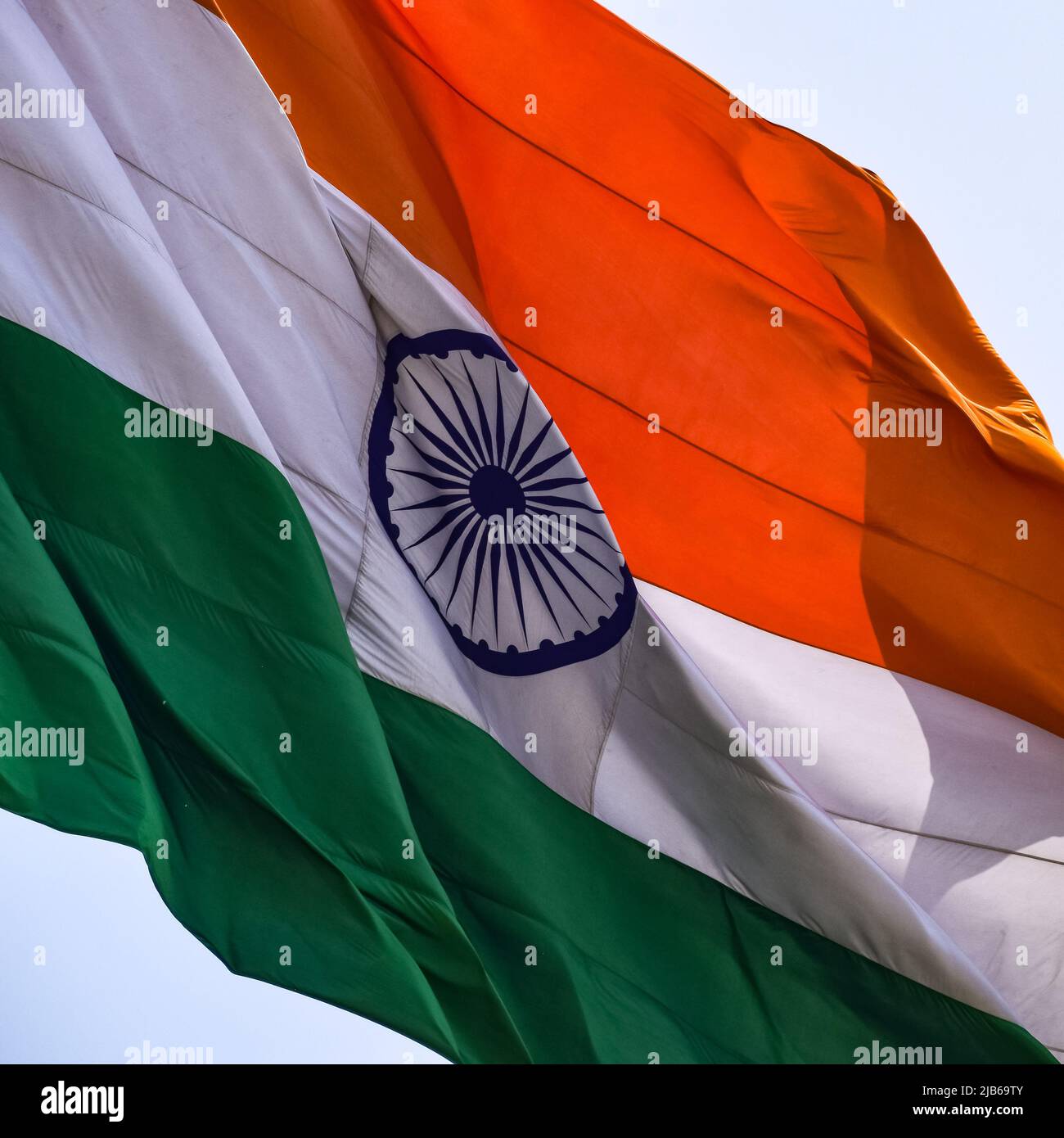 India flag flying high at Connaught Place with pride in blue sky, India ...