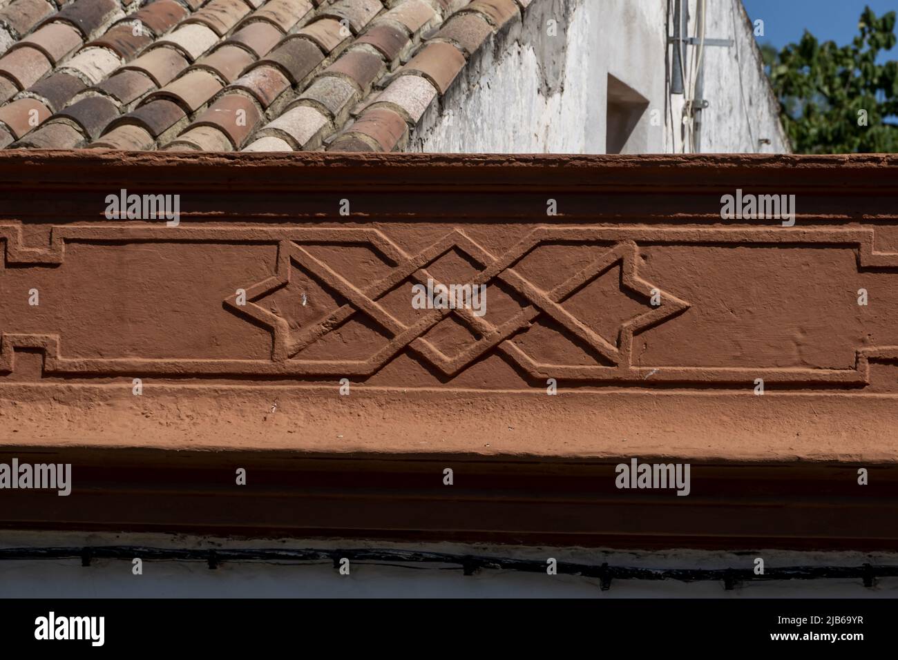 Close view of a traditional pediment in the village of Luz, Algarve ...
