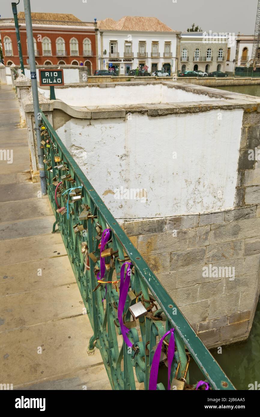 Roman bridge over River Gilao in Tavira, Algarve, Portugal Stock Photo ...