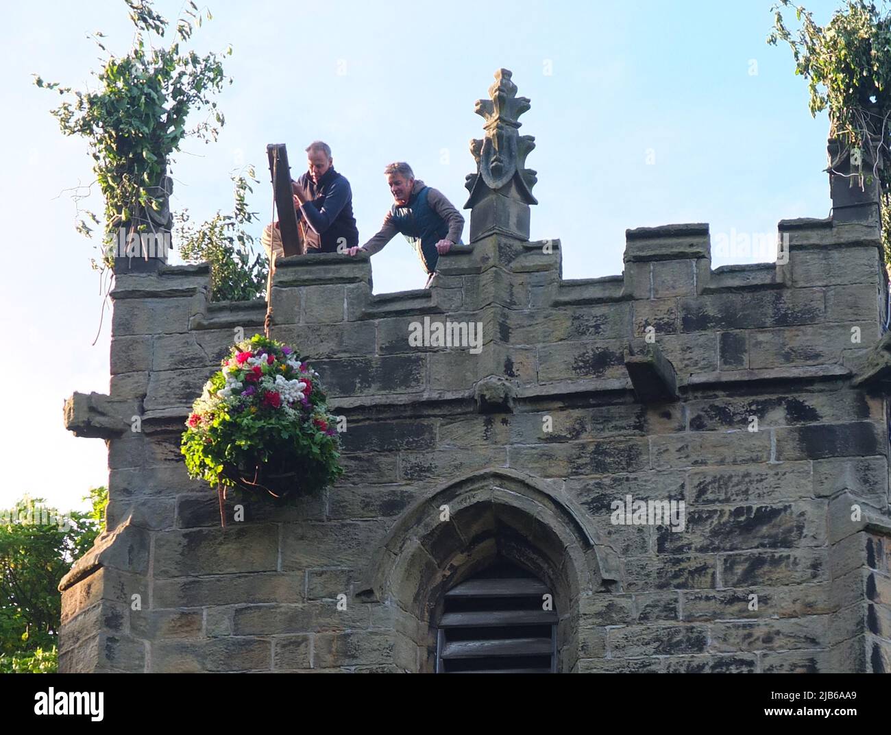 The Garland is hoisted up the tower of St Edmunds Church at the ...