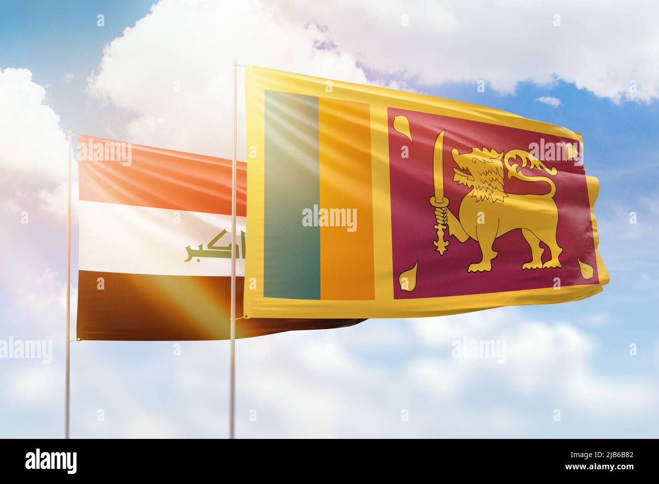 Sunny blue sky and flags of sri lanka and iraq Stock Photo - Alamy