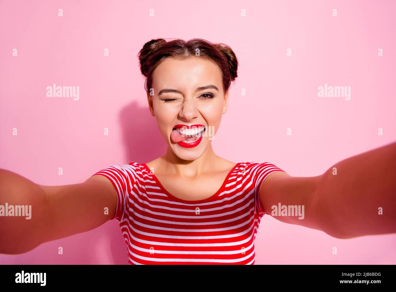 Photo of funky cool lady dressed striped t-shirt recording self video ...
