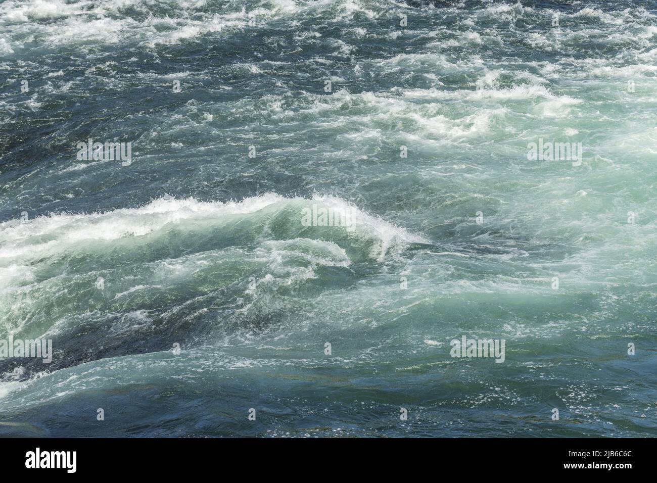 Fast currents in Rhine Falls in spring. Neuhausen am reinfall ...