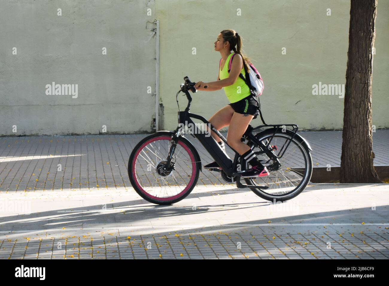 Woman riding an ebike hi-res stock photography and images - Alamy