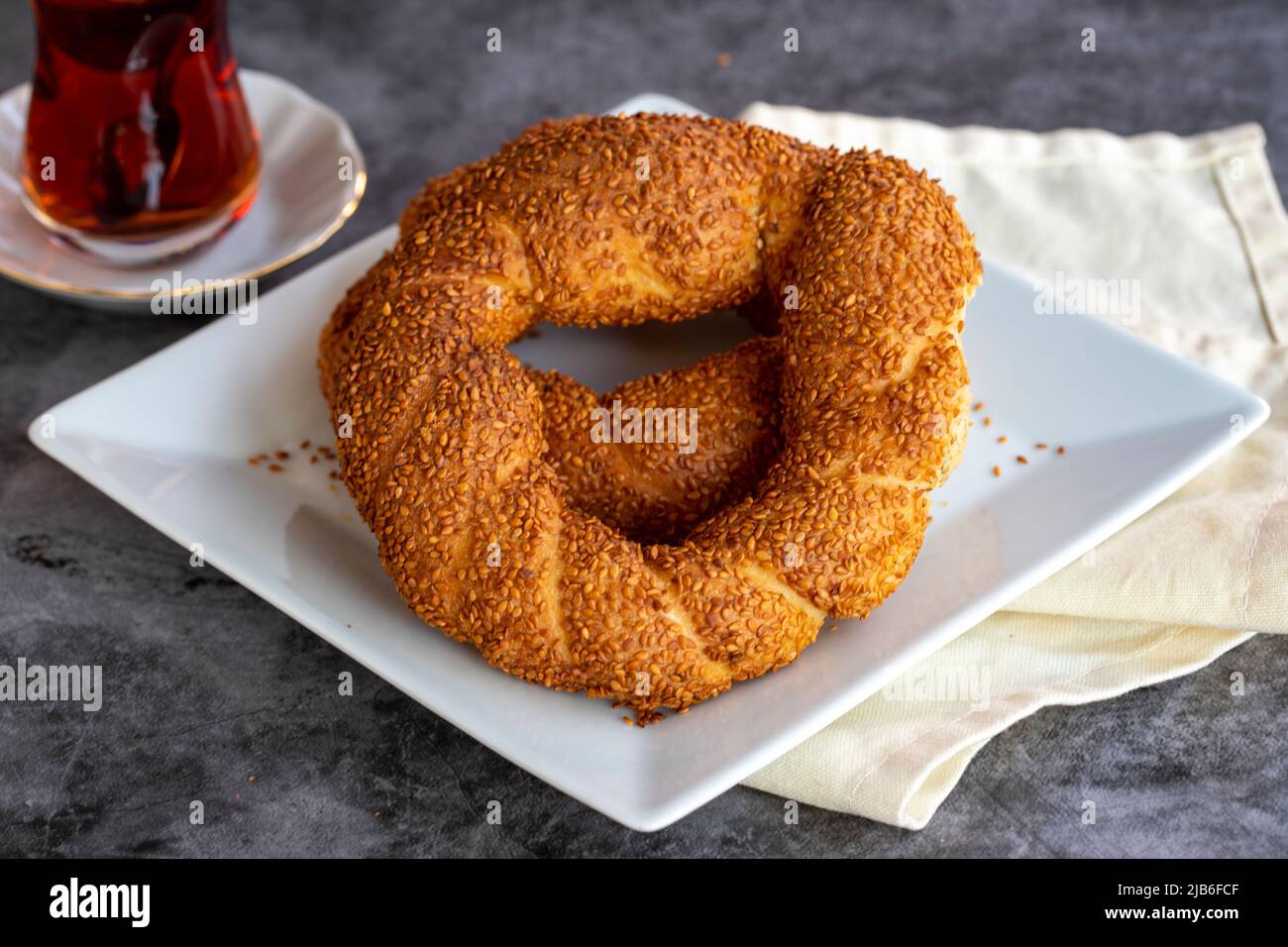Sesame bagel. Turkish pastry product. Sesame bagel on a dark background ...