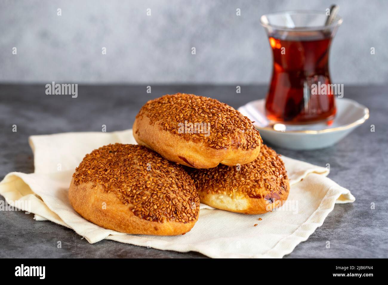 Cheese Pogaca. Turkish pastry product. Sesame pogaca on a dark ...
