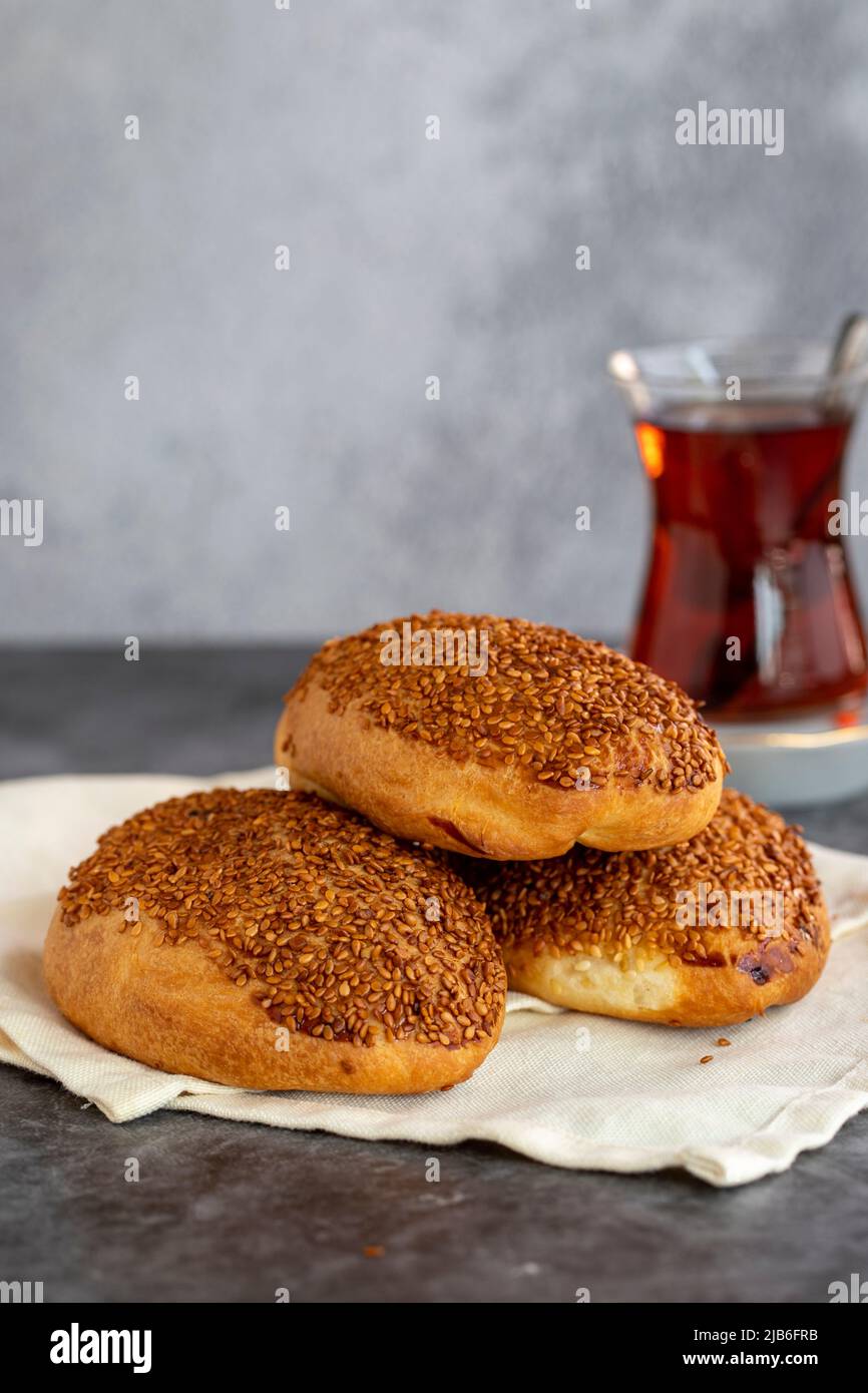 Cheese Pogaca. Turkish pastry product. Sesame pogaca on a dark ...