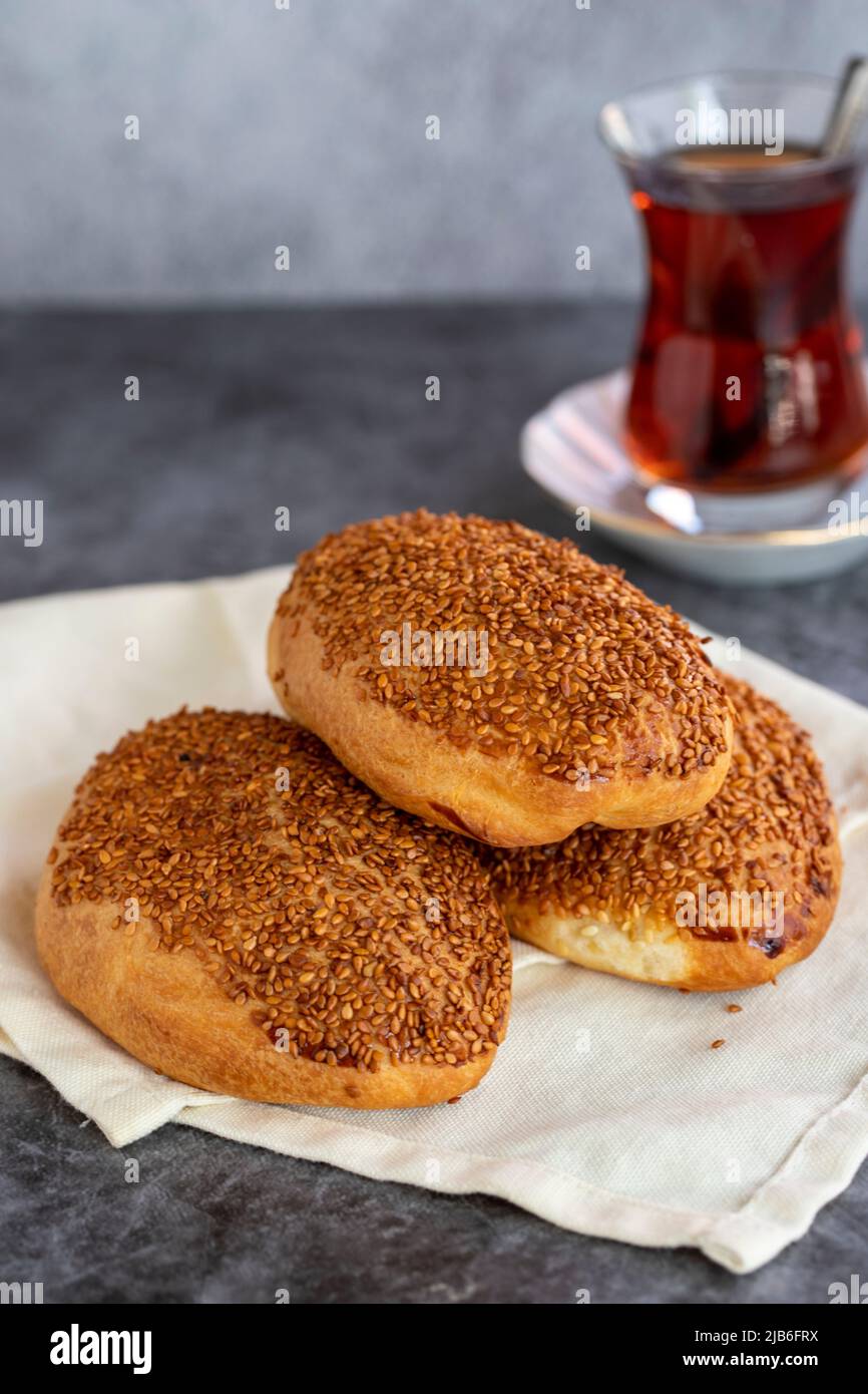 Cheese Pogaca. Turkish pastry product. Sesame pogaca on a dark ...