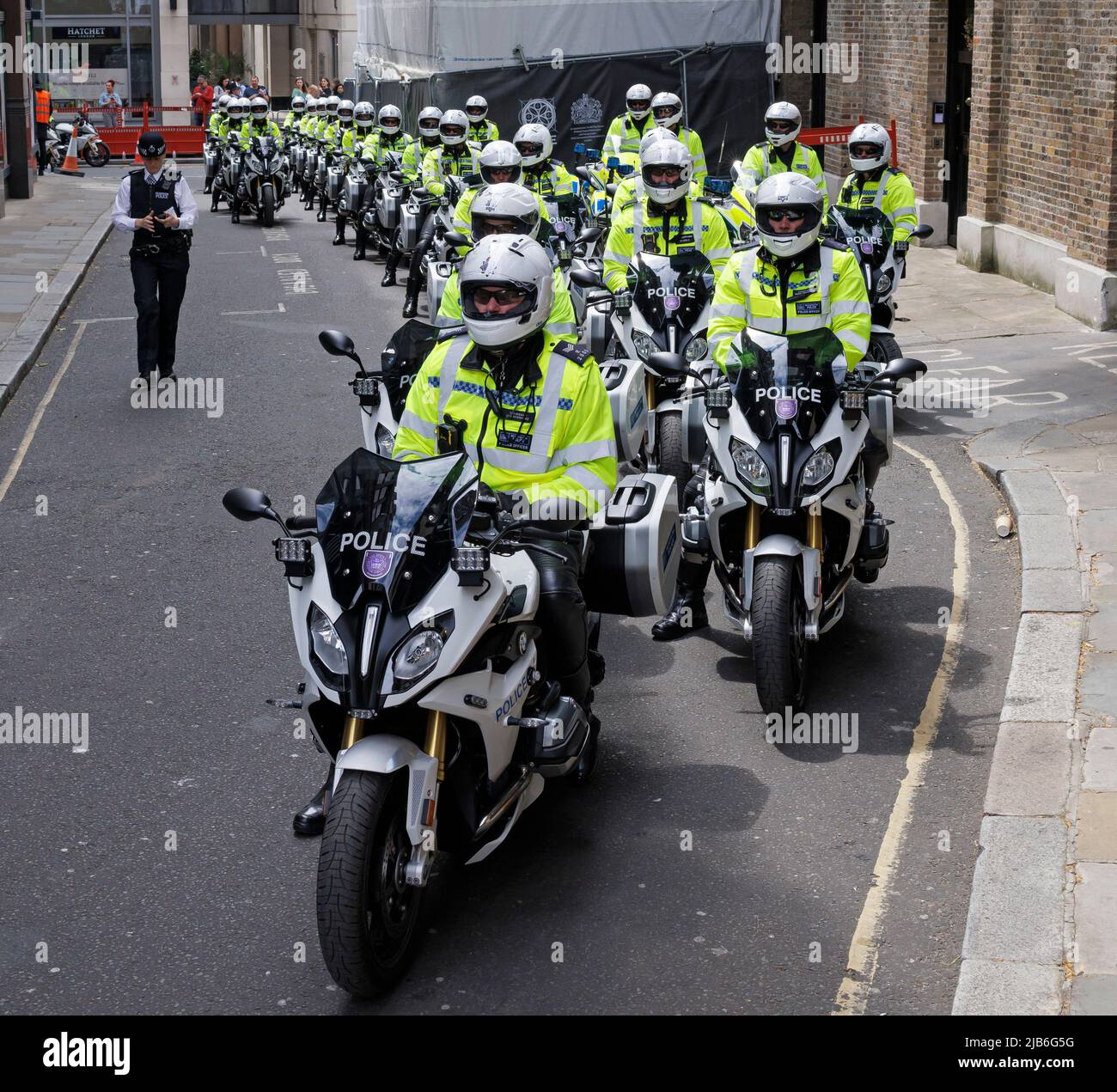 London, UK. 03rd June, 2022. A large group of police outriders wait to ...