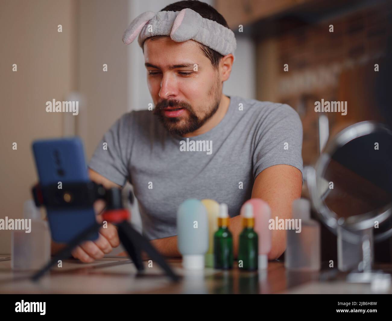 Men's beauty concept. caucAsian guy checking his skin. Beauty blogger ...