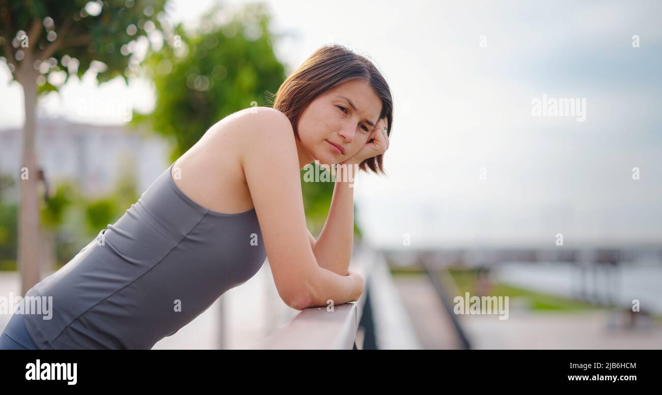 asian young strong, confident woman in sportive clothes feeling bad ...