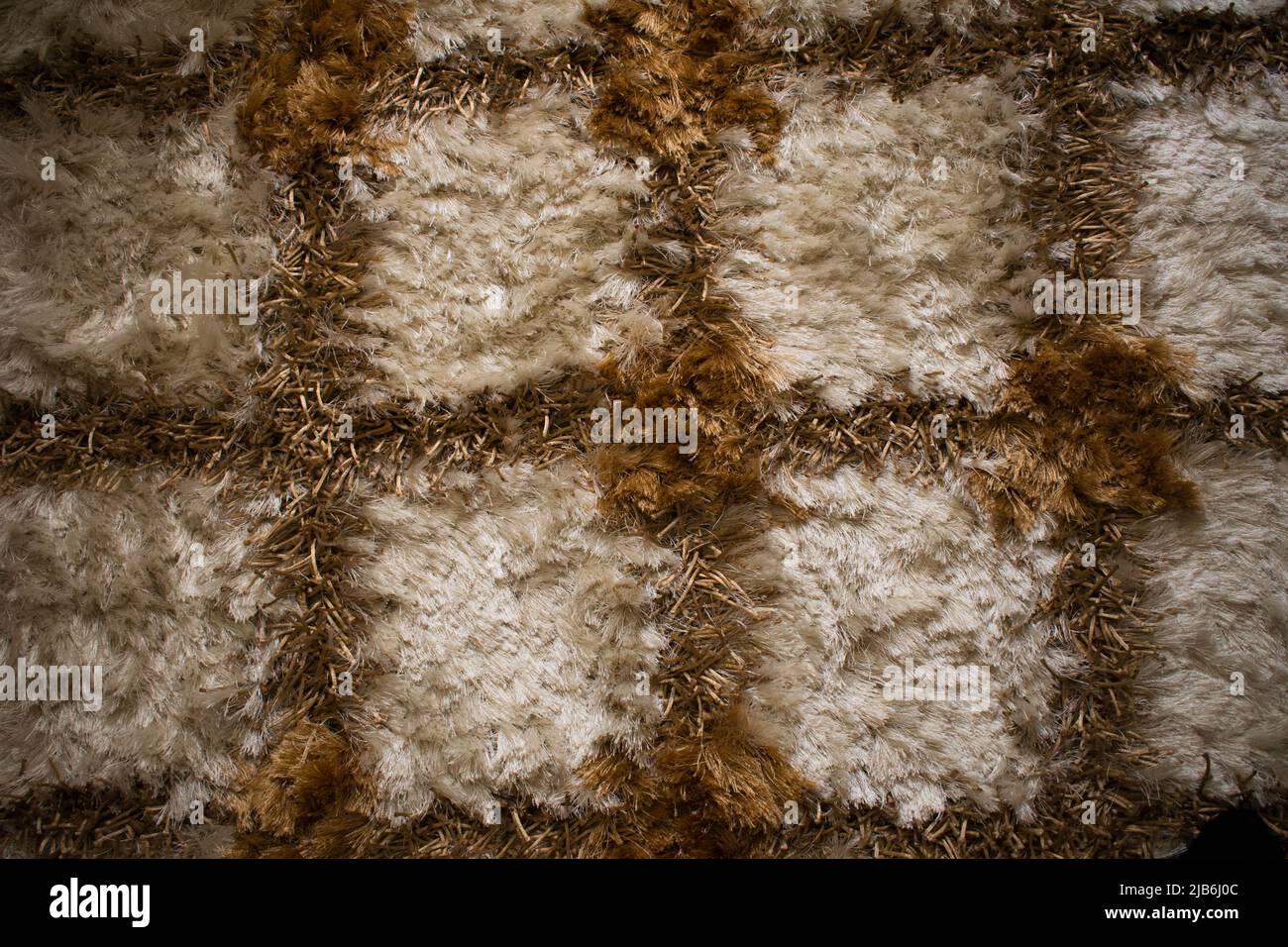 A pattern on a carpet with squares Stock Photo - Alamy