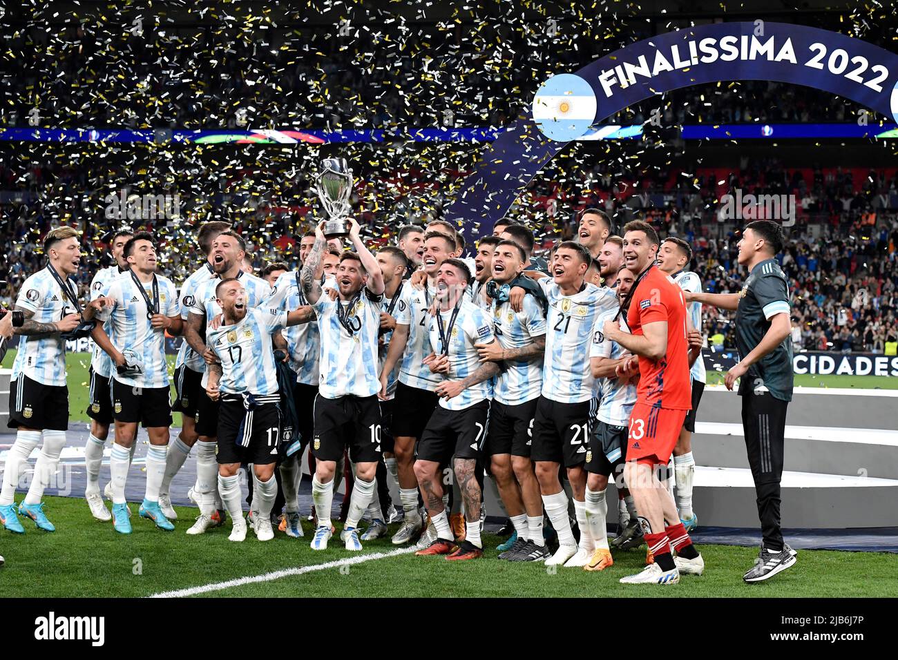 Lionel Messi of Argentina and teammates celebrate with the trophy at ...