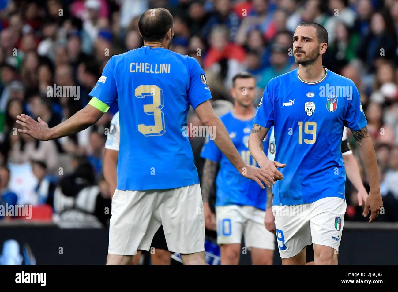 Giorgio Chiellini and Leonardo Bonucci of Italy react during the ...