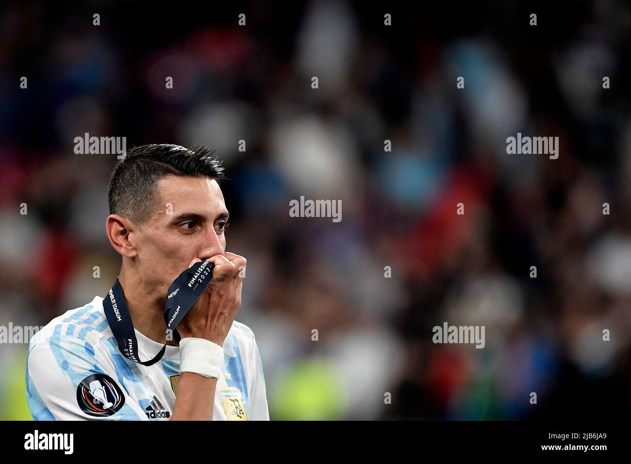 Angel Di Maria of Argentina kisses the medal while celebrating at the ...