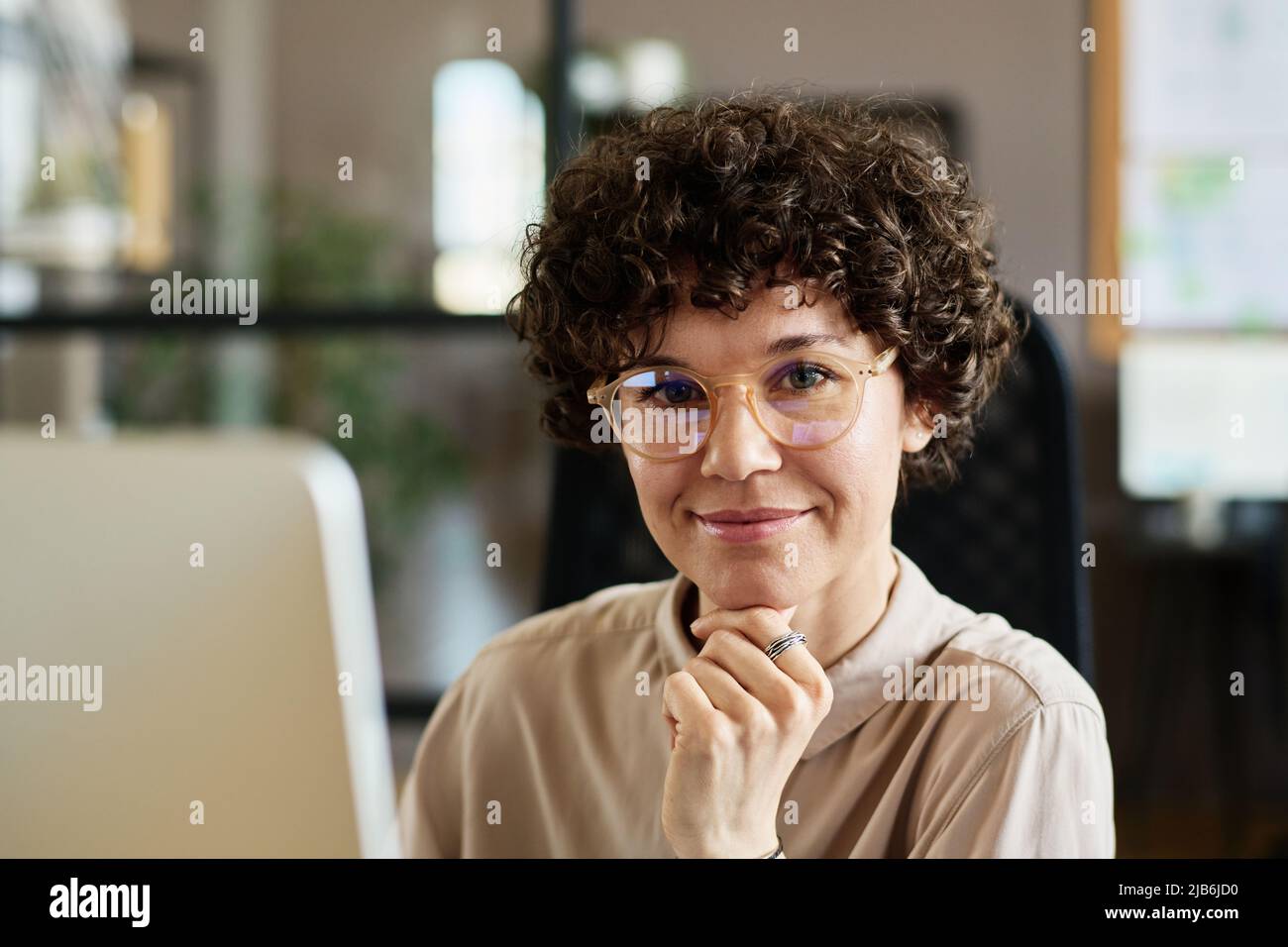 Portrait smart secretary looking camera hi-res stock photography and ...