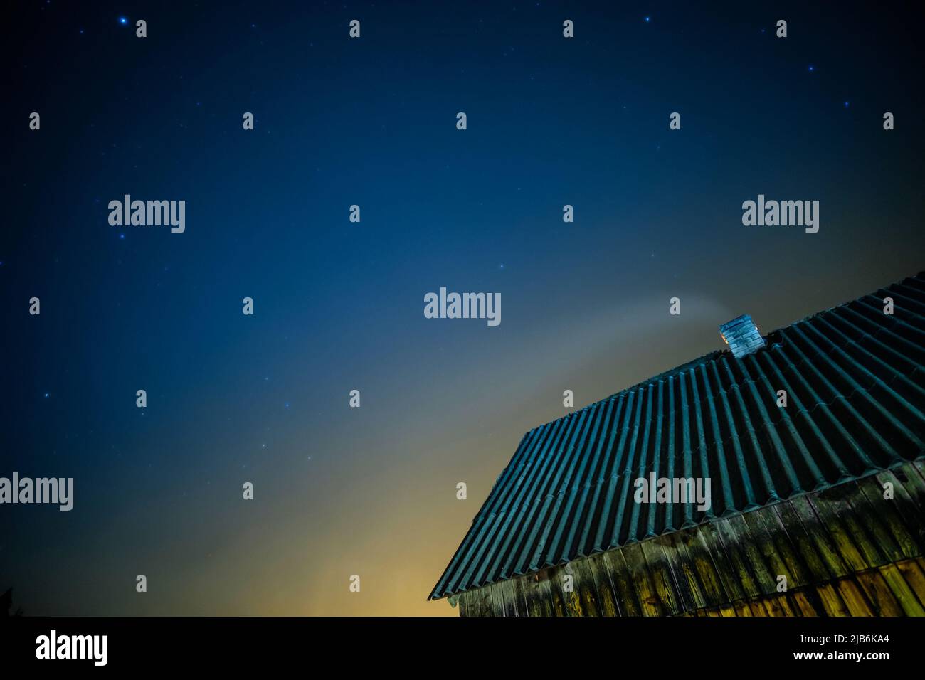 Smoke from the chimney at moon night Stock Photo - Alamy