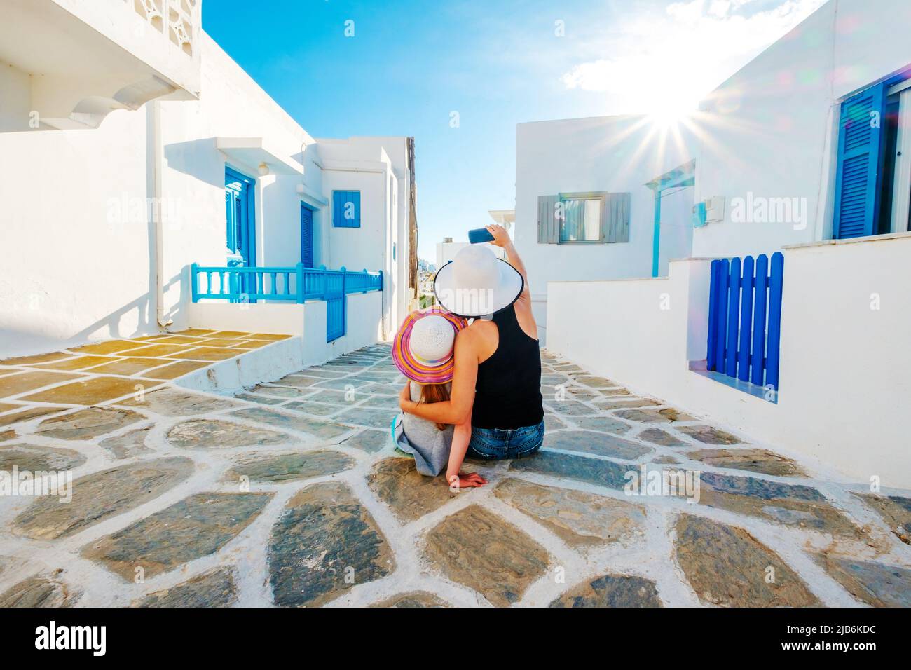 Mum and daughter taking selfie on the greek street Stock Photo - Alamy