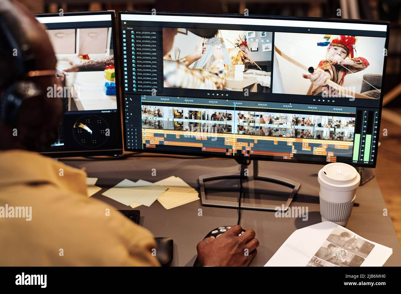 Computer monitor with photo editing software on screen using by ...