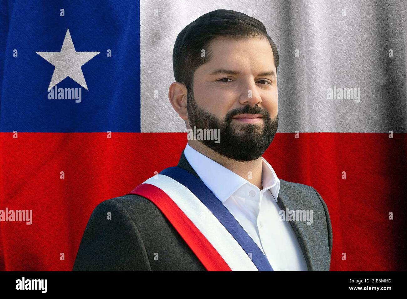 Gabriel Boric and the flag of Chile Stock Photo - Alamy