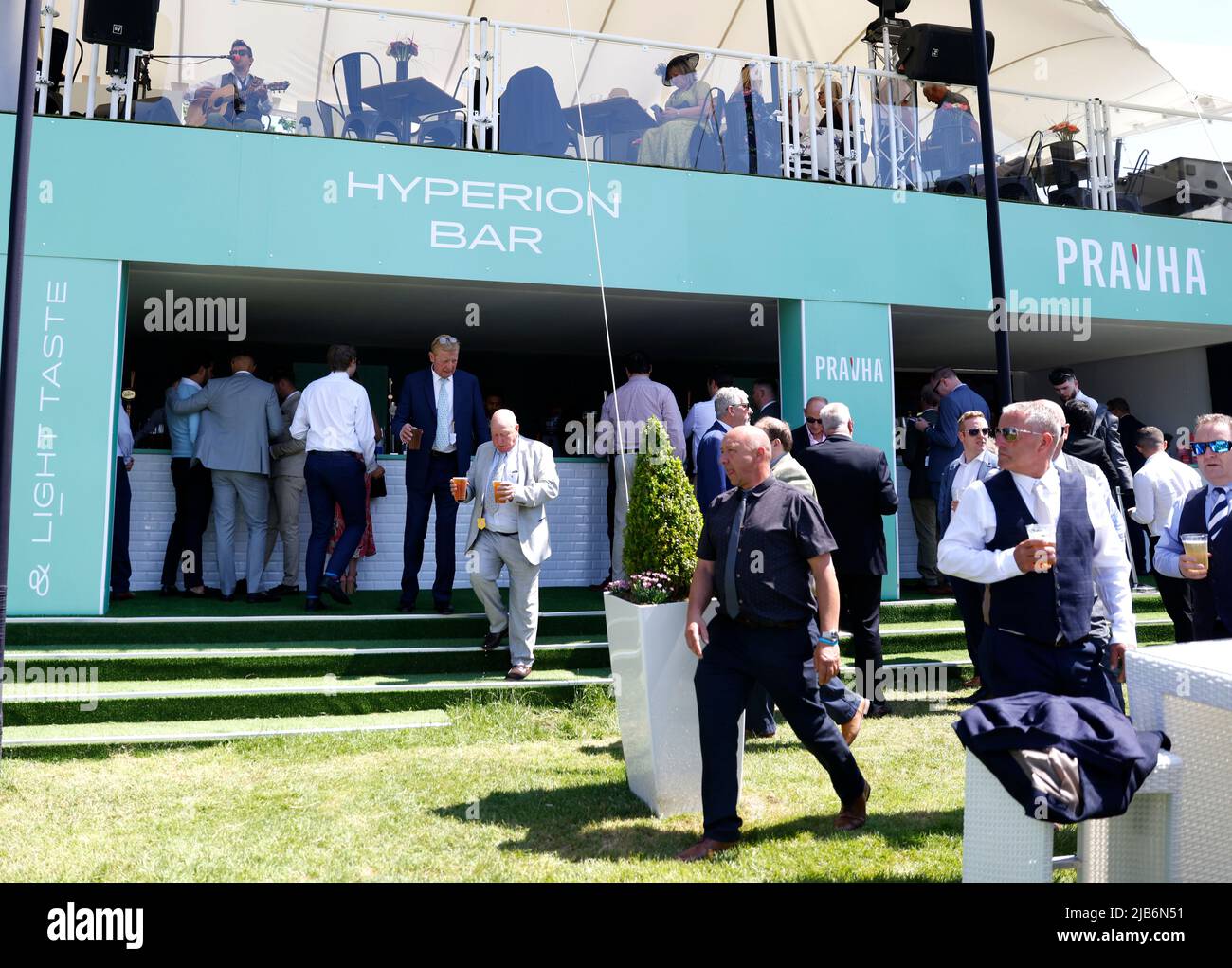 Guests relax outside the Pravha Hyperion bar on Ladies Day during the ...