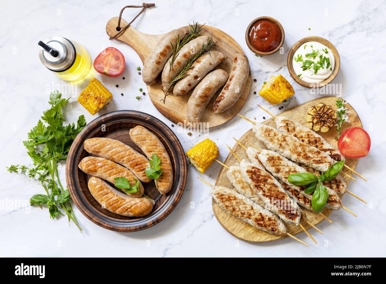 Summer party food. Grill food menu. Various bbq grilled sausages with ...