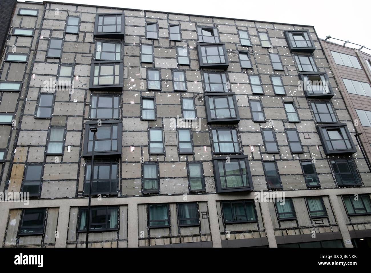 Exterior view of facade of apartment building apartments flats housing ...