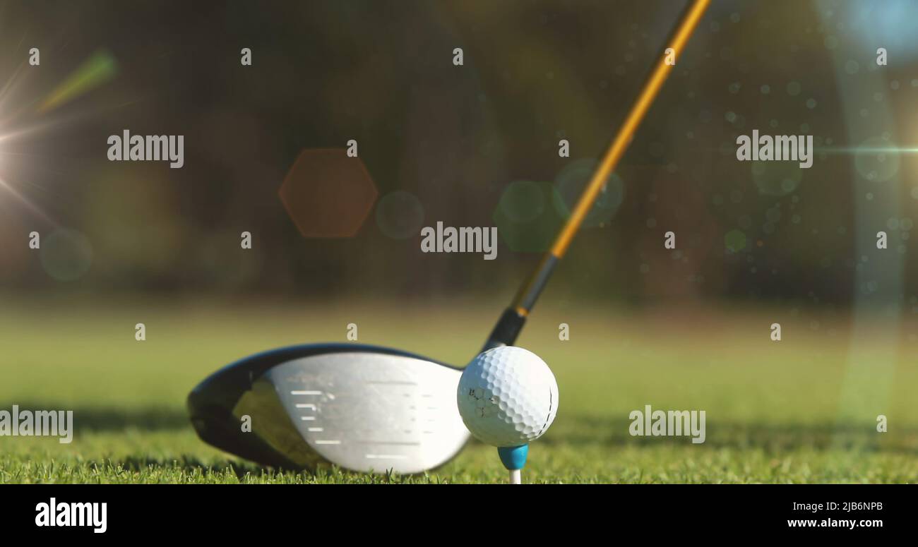Image of light spots over golf ball and golf club Stock Photo - Alamy
