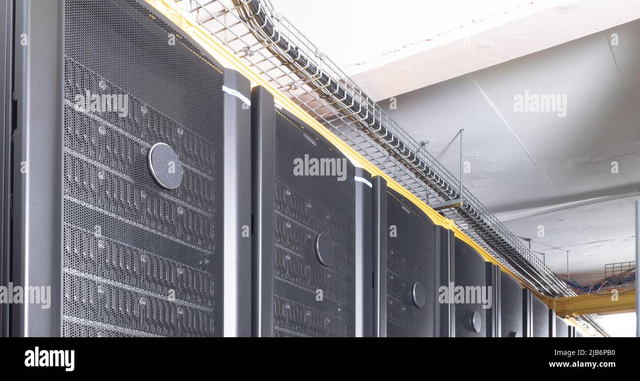 Image of empty corridor with row of computer servers Stock Photo - Alamy