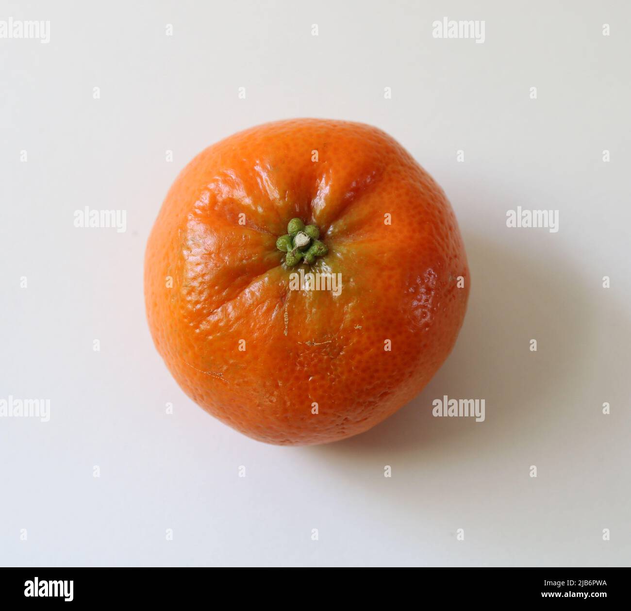 A Small Clementine Fruit Isolated on a White Background Stock Photo - Alamy