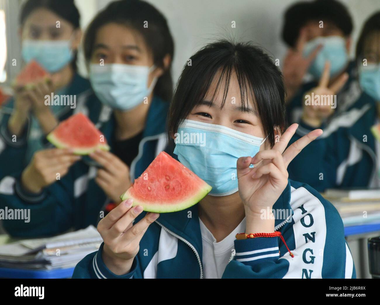 HANDAN, CHINA - JUNE 3, 2022 - Senior three students show the ...