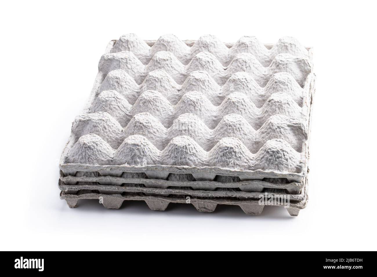 New grey cardboard egg trays holds 30 eggs isolated on white Stock ...