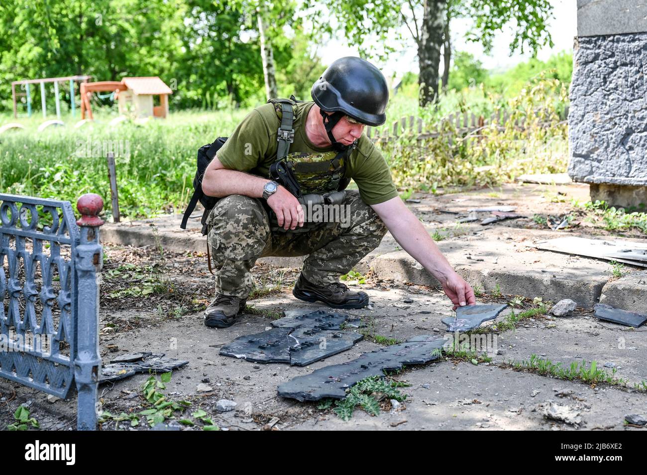 A soldier of AFU is seen in Zelene Pole village destroyed by the ...