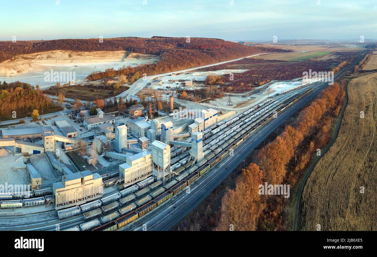 Aerial view of cargo train loaded with crushed stone materials at ...