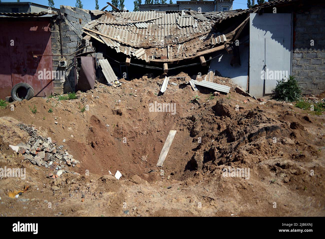 A crater left by a Russian shell is pictured in the Pivnichna (Northern ...