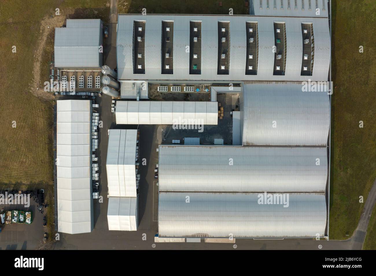 Aerial view of modern factory structure for production and distribution ...