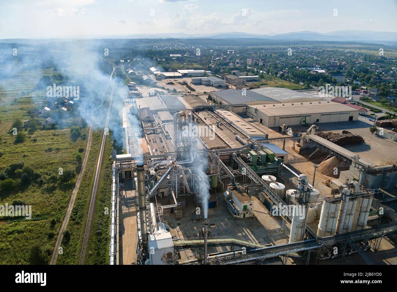 Aerial view of oil and gas refining petrochemical factory with tall ...