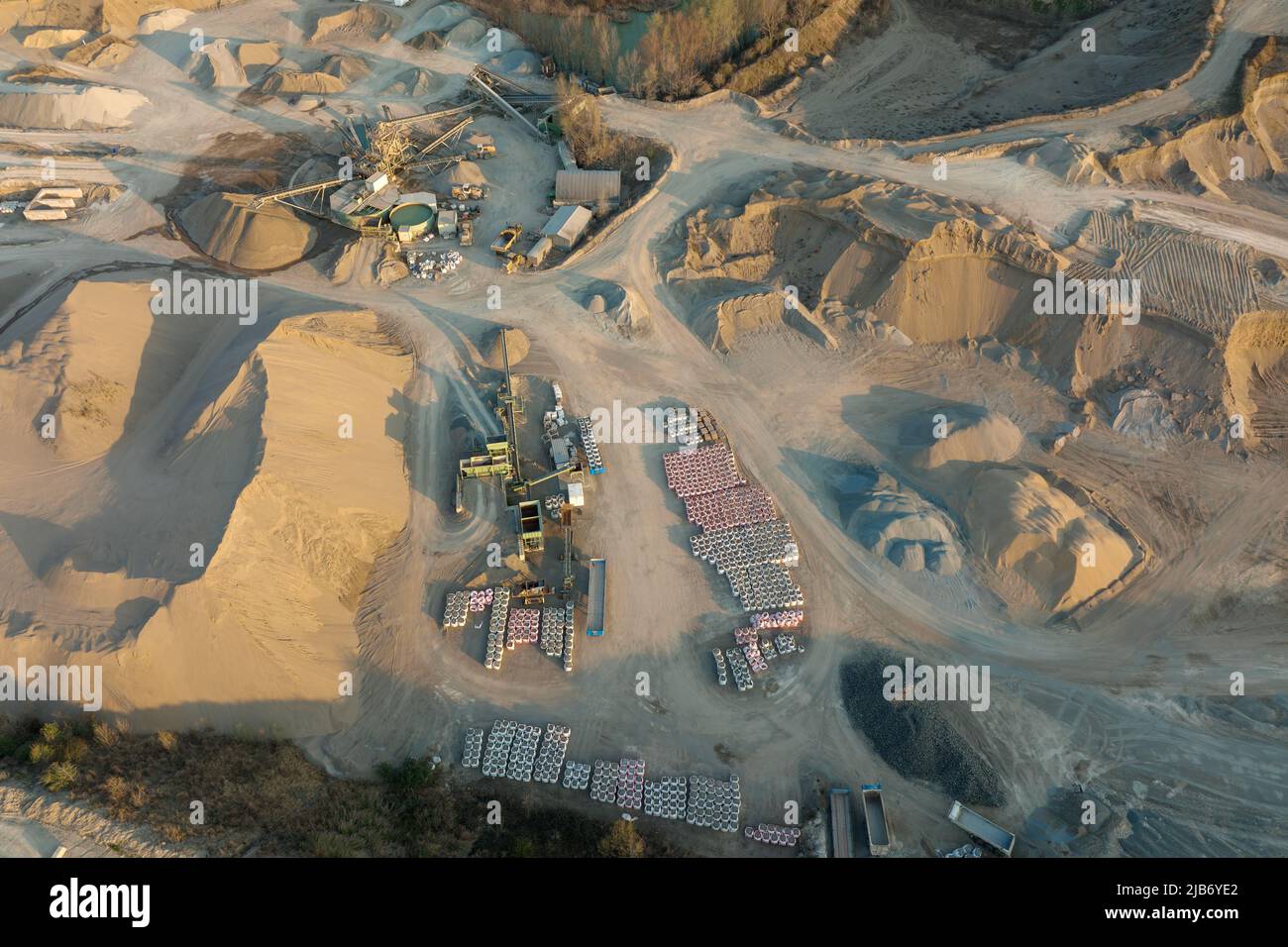 Aerial view of open pit mining site of limestone materials extraction ...