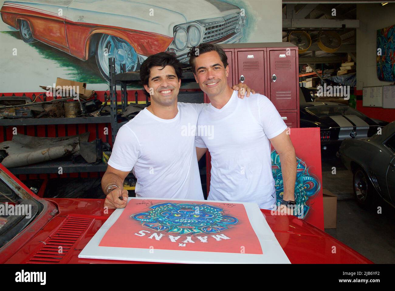 MIAMI, FL - JUNE 2: Mijares and Danny Pino attend the unveiling of a ...