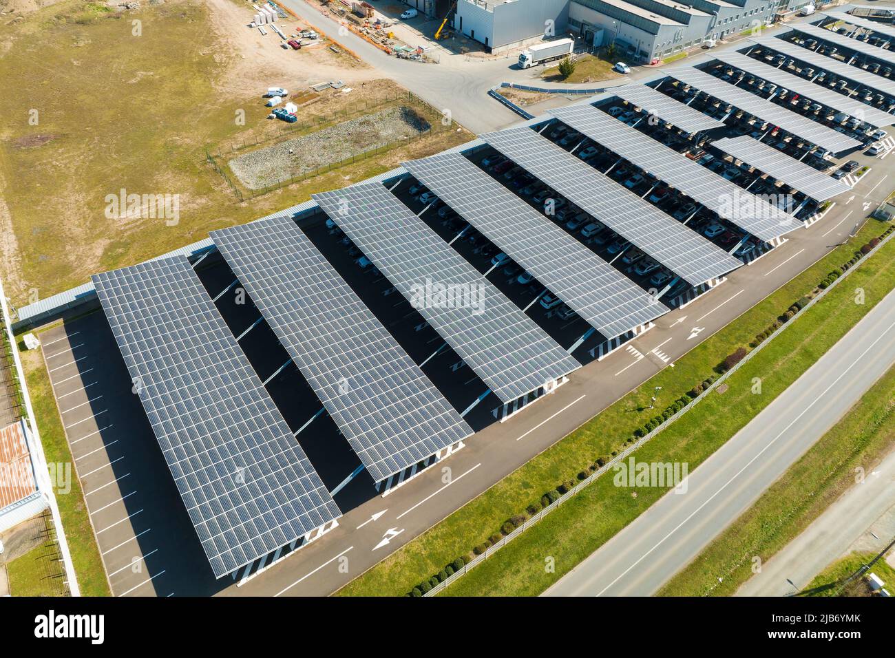 Aerial view of solar panels installed as shade roof over parking lot ...