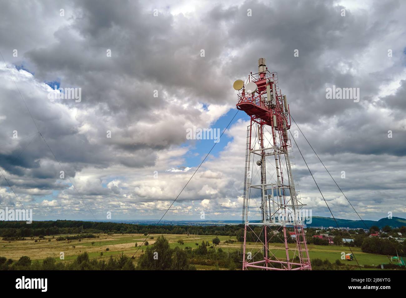 Aerial view of telecommunications cell phone tower with wireless ...